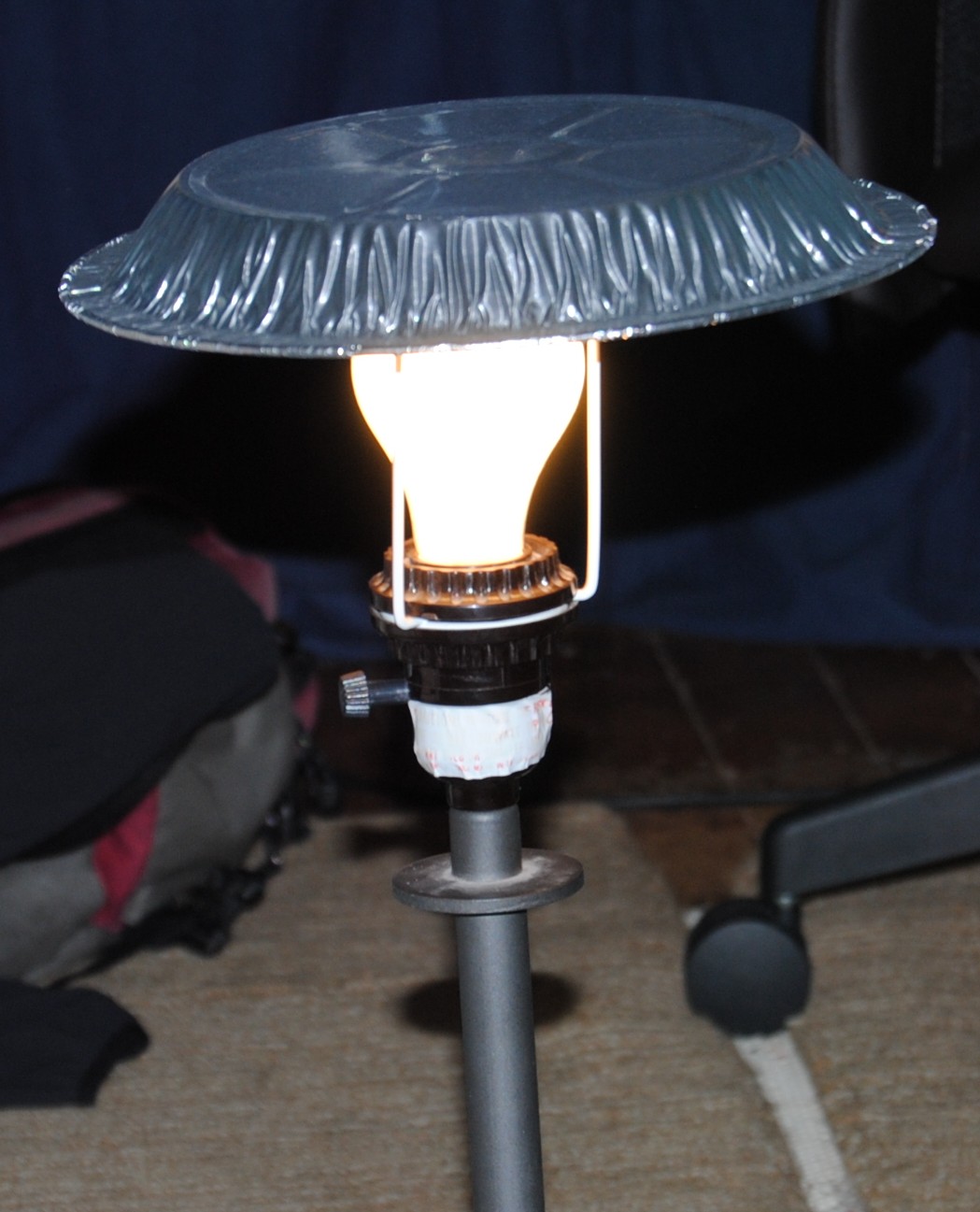 Reflector for bare light bulb