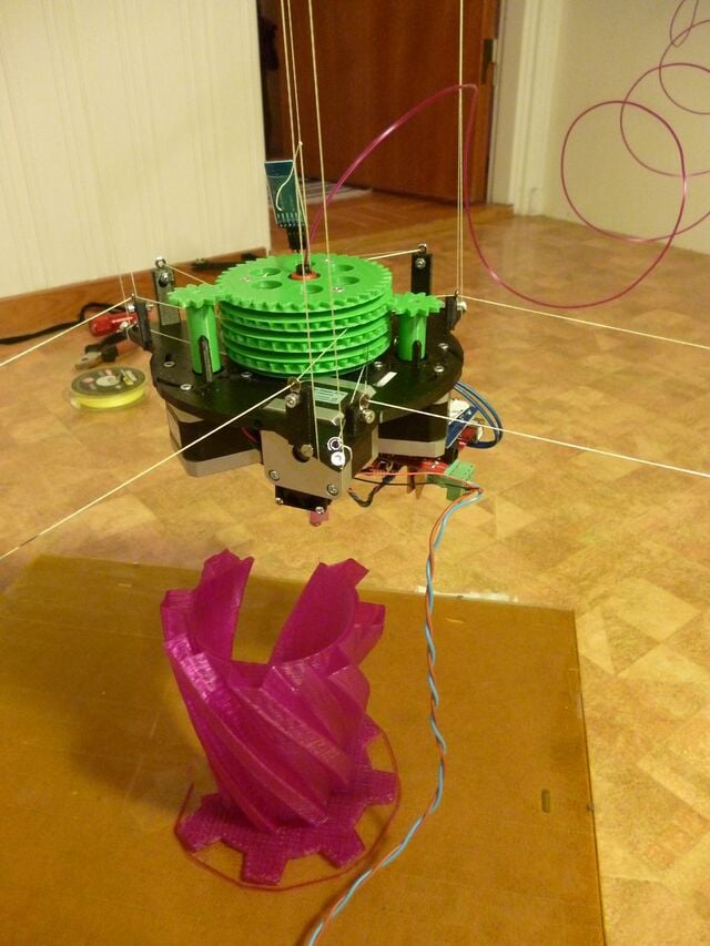 Clerck, a RepRap 3D printer hanging from the ceiling
